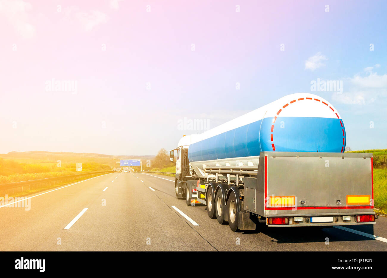 Big fuel gas tanker truck on highway Stock Photo - Alamy