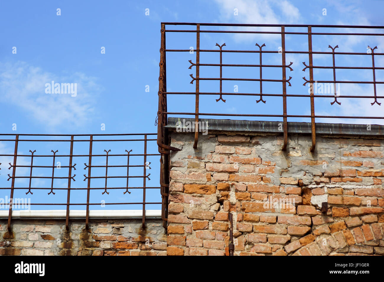 medieval balcony in front at castle On a red brick facade Stock Photo ...