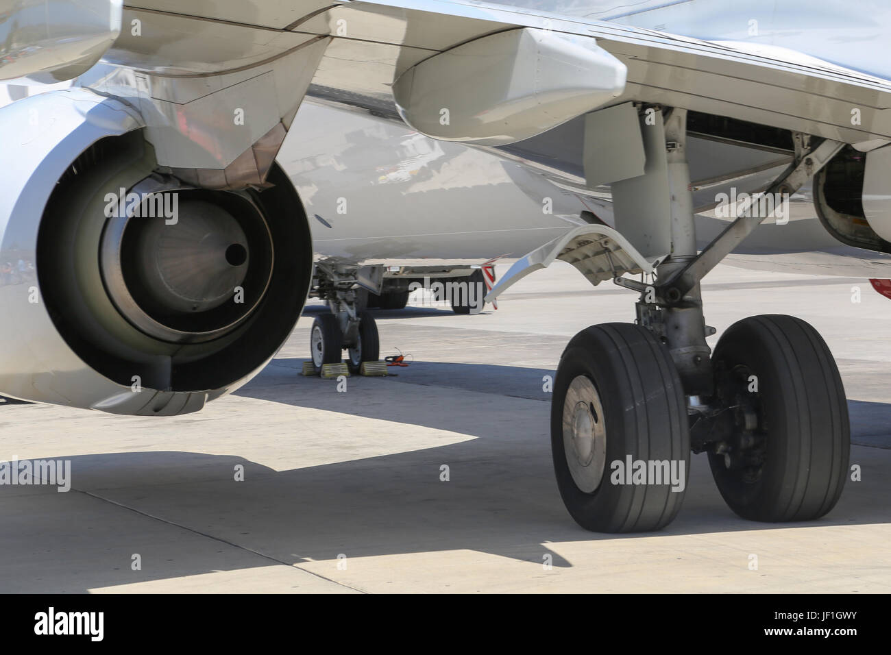 Aircraft wheel and engine Stock Photo - Alamy