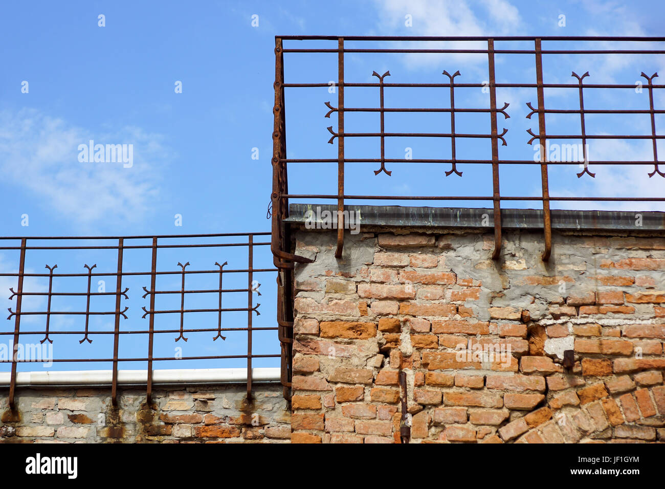 medieval balcony in front at castle On a red brick facade Stock Photo ...