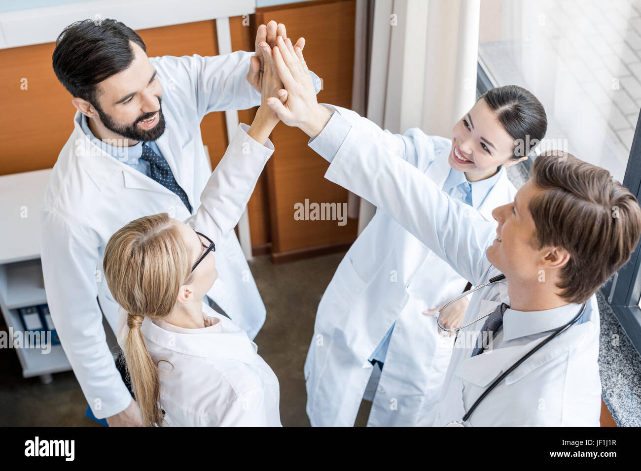 Happy doctors hi-res stock photography and images - Alamy