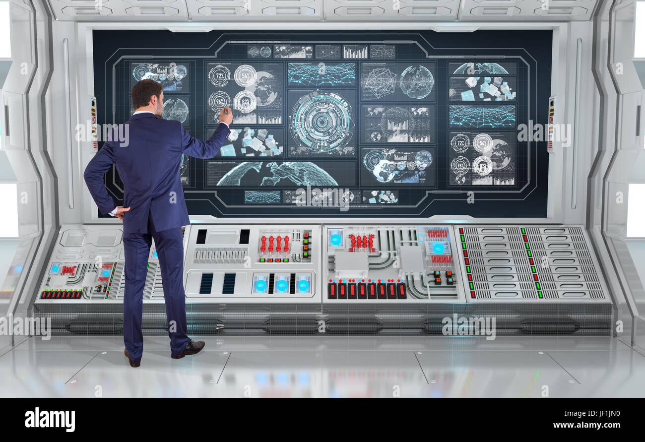 Businessman in modern interior using graph screens interface on a board ...