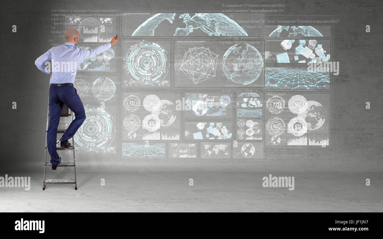 Businessman in modern interior using graph screens interface on a wall ...