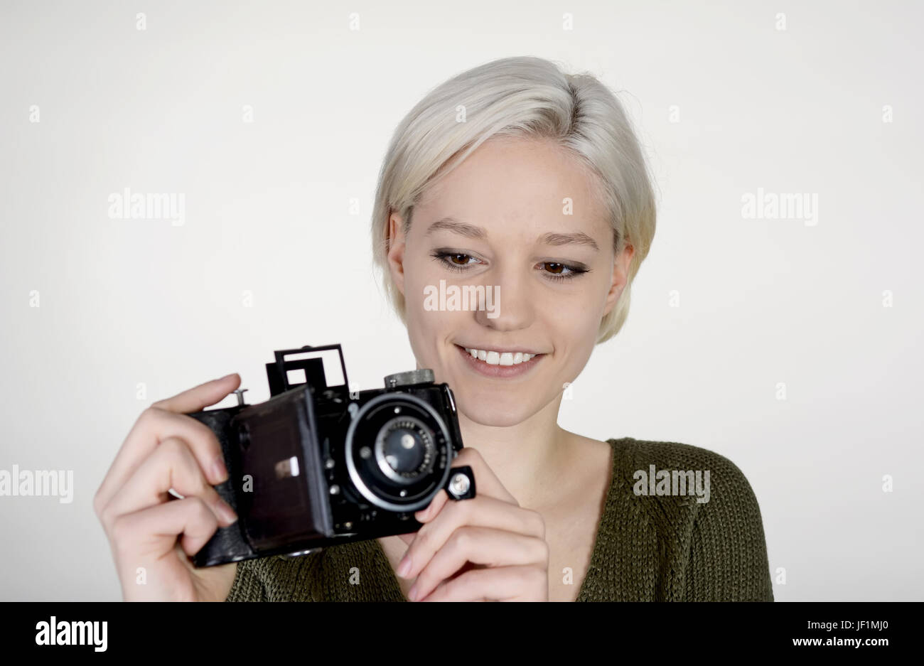 woman with old camera Stock Photo - Alamy
