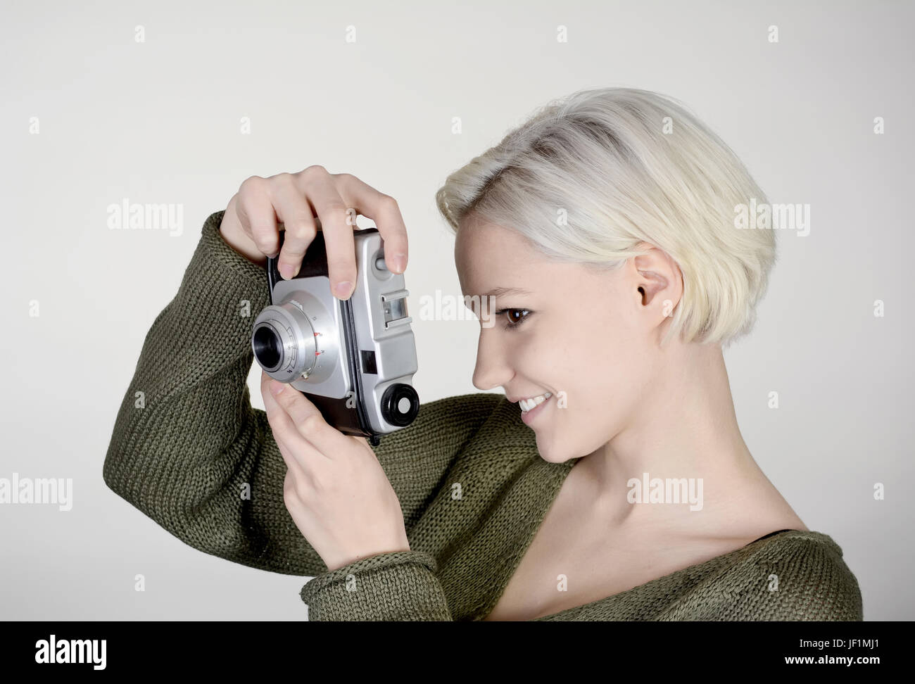 woman with old camera Stock Photo - Alamy