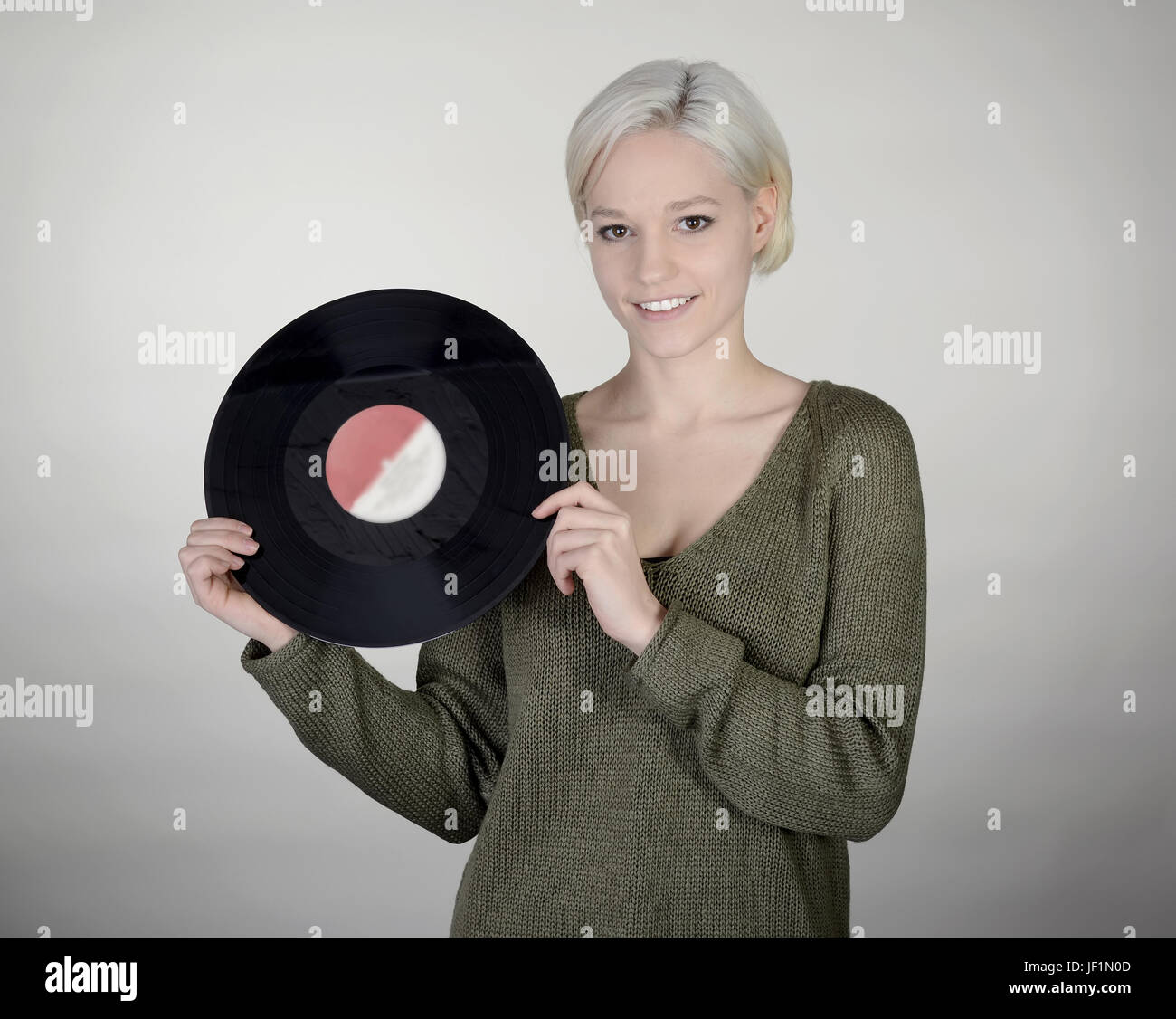 woman with record Stock Photo - Alamy