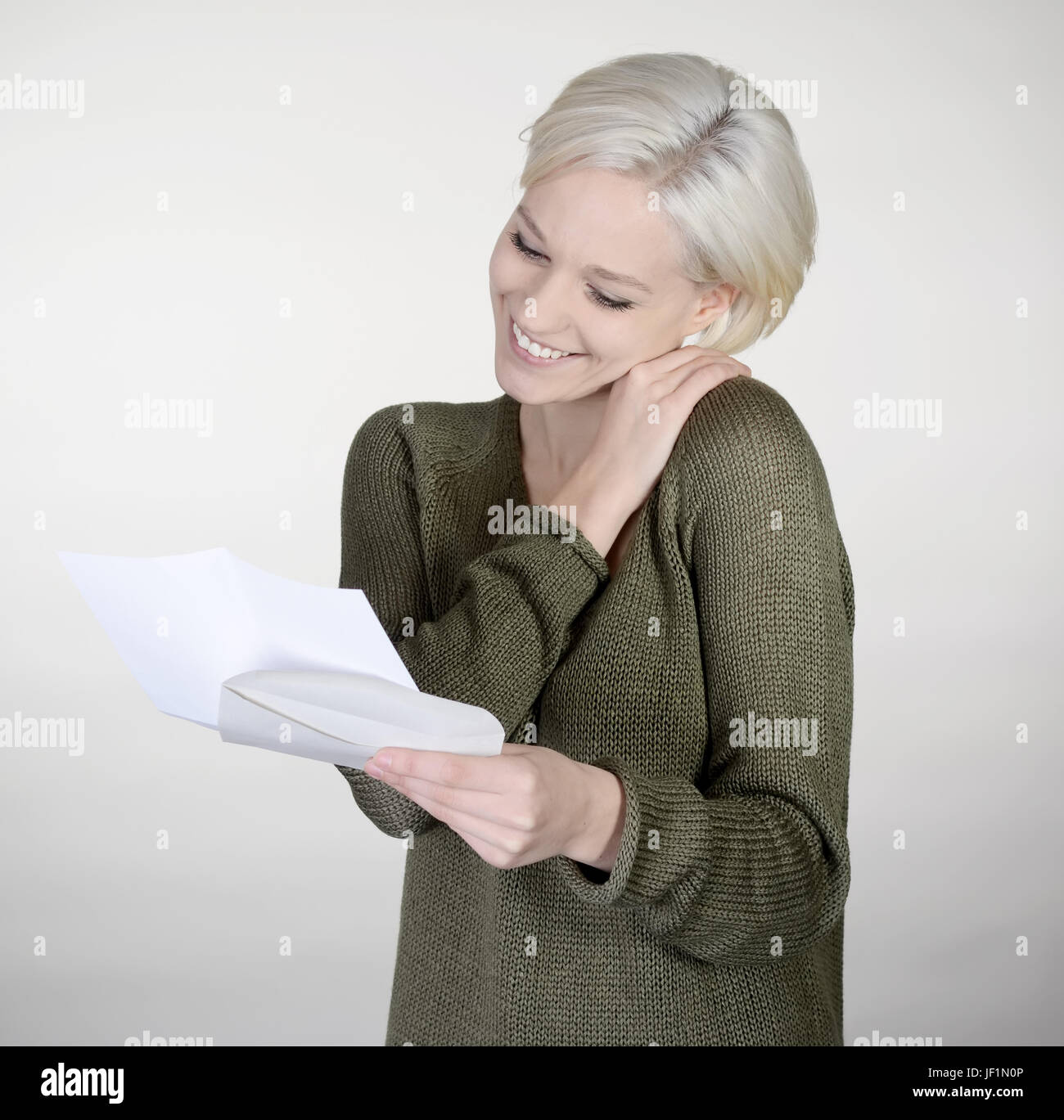 woman reading letter Stock Photo - Alamy