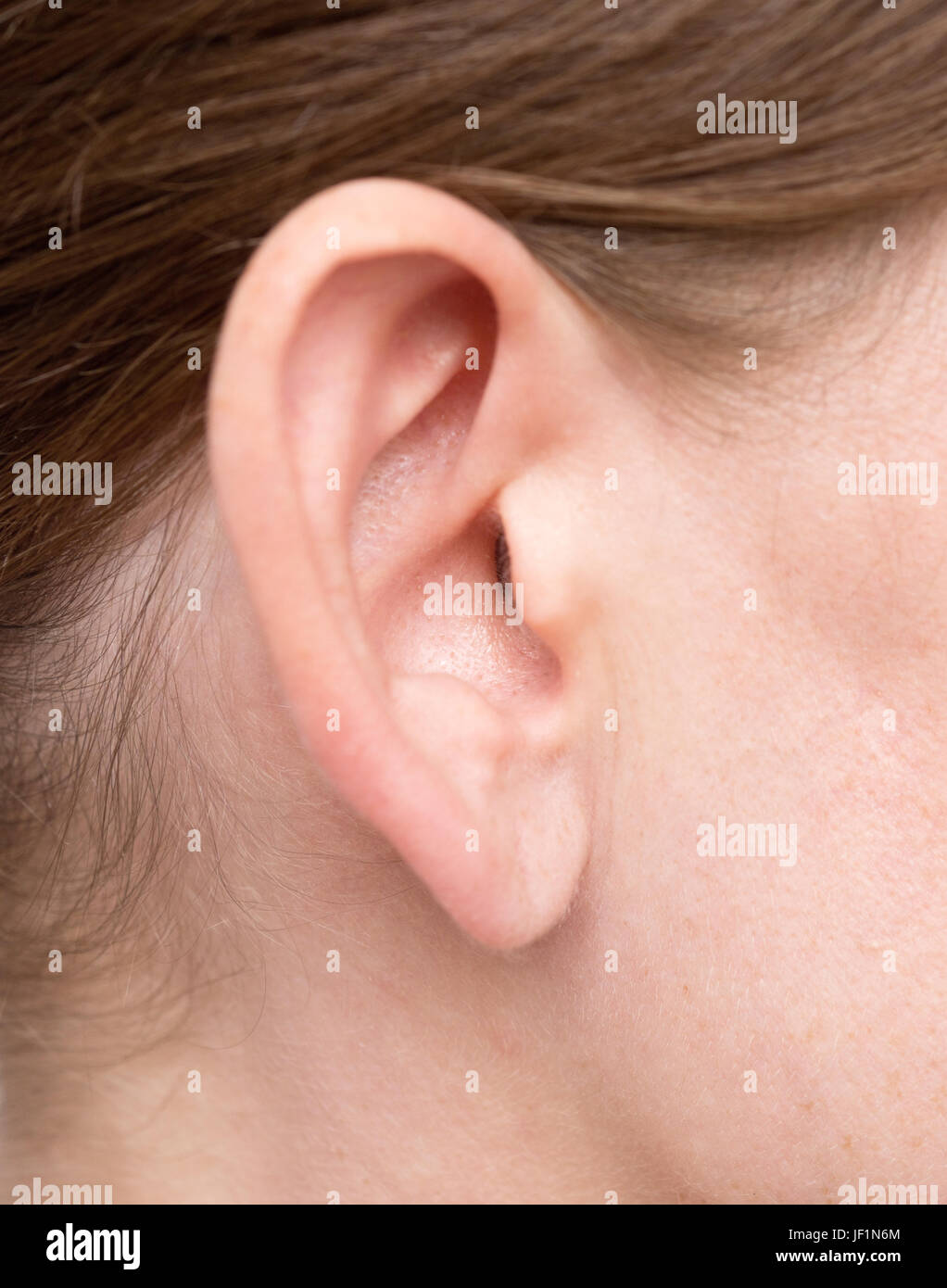 beautiful woman ear Stock Photo - Alamy