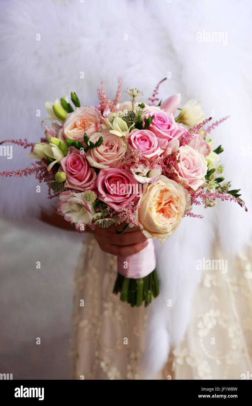The bride holds a wedding bouquet Stock Photo - Alamy