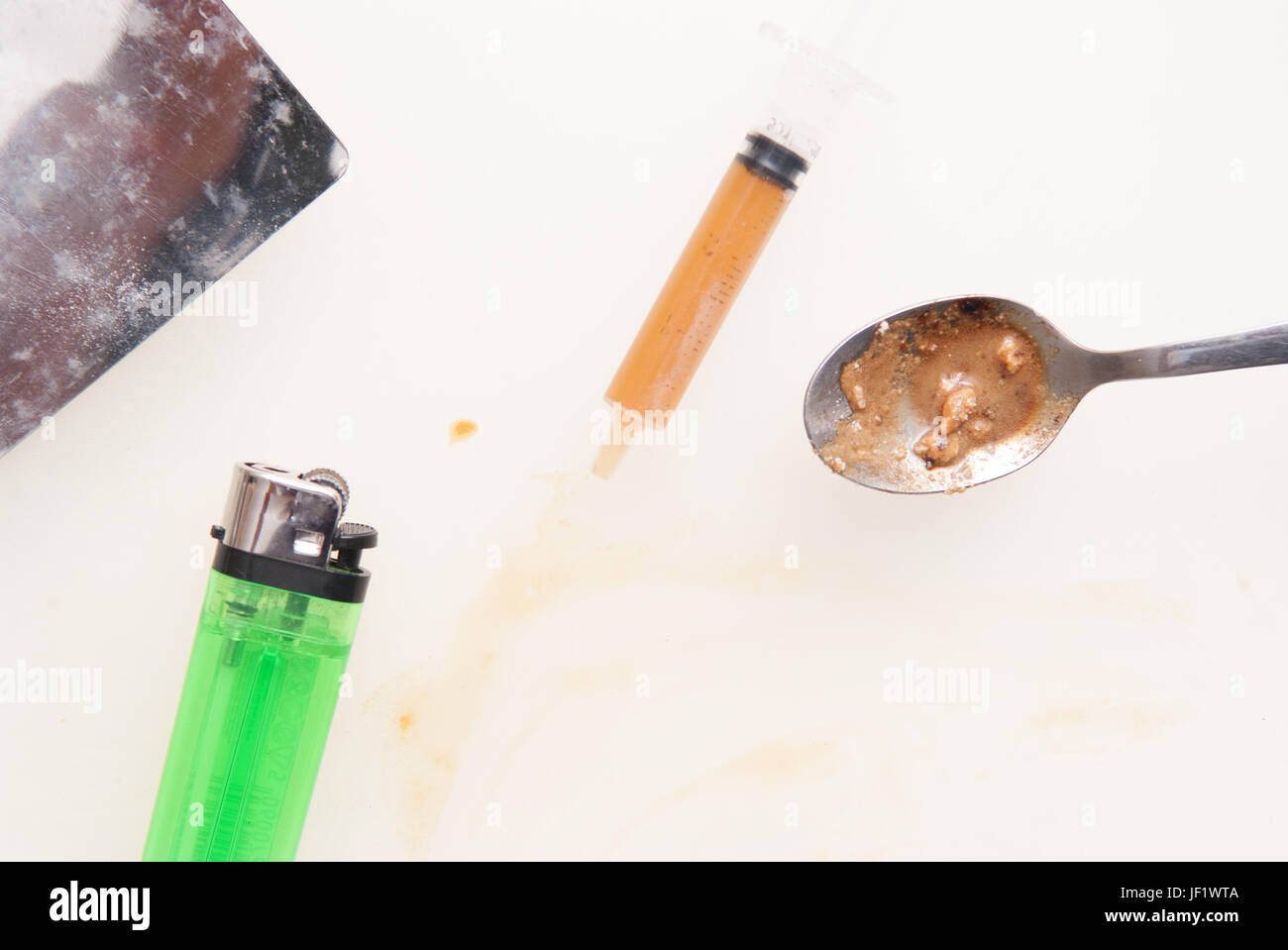 drugs and substance abuse, cooked heroin and syringe Stock Photo - Alamy