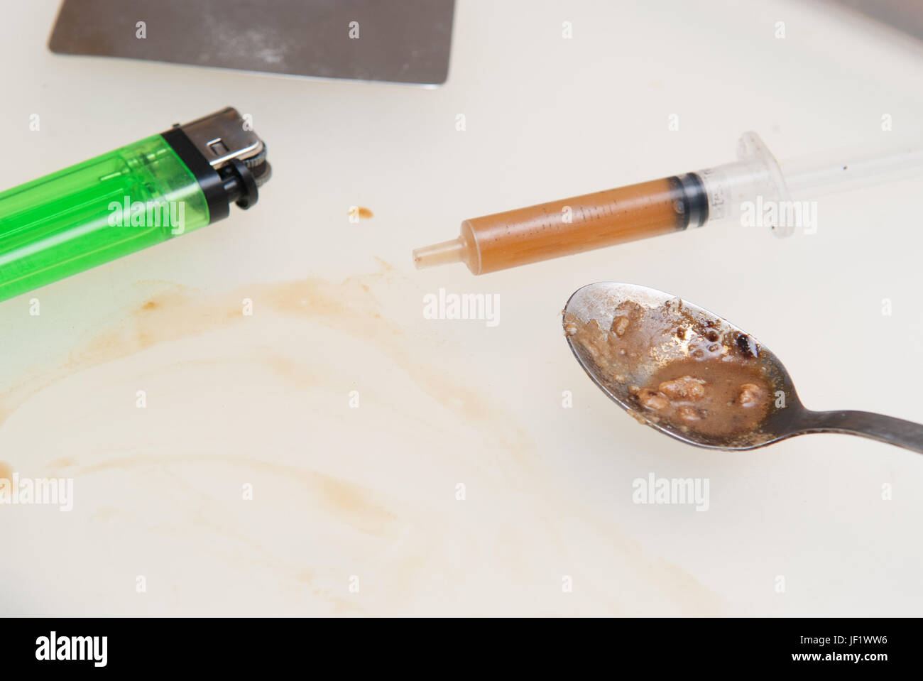 drugs and substance abuse, cooked heroin and syringe Stock Photo - Alamy