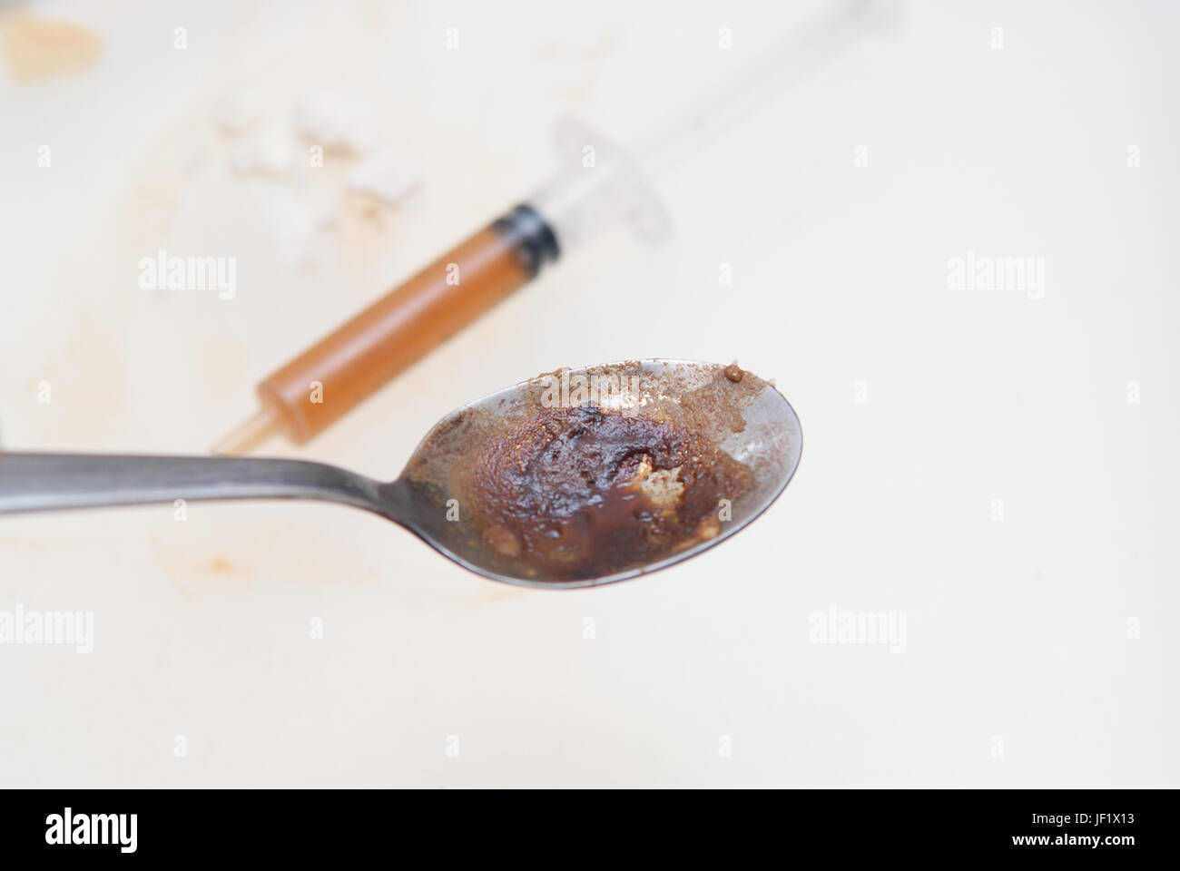 drugs and substance abuse, cooked heroin and syringe Stock Photo - Alamy