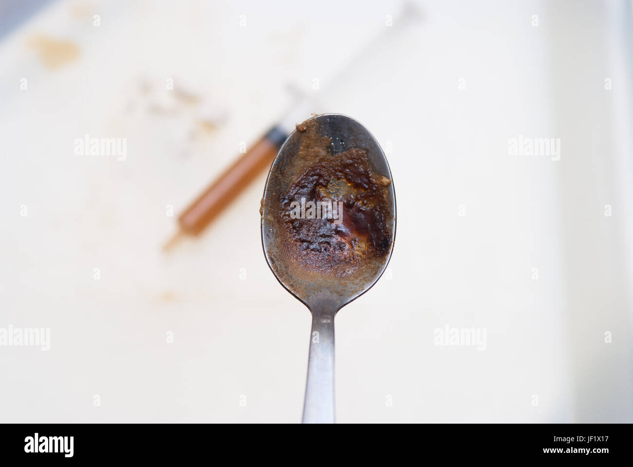 drugs and substance abuse, cooked heroin and syringe Stock Photo - Alamy