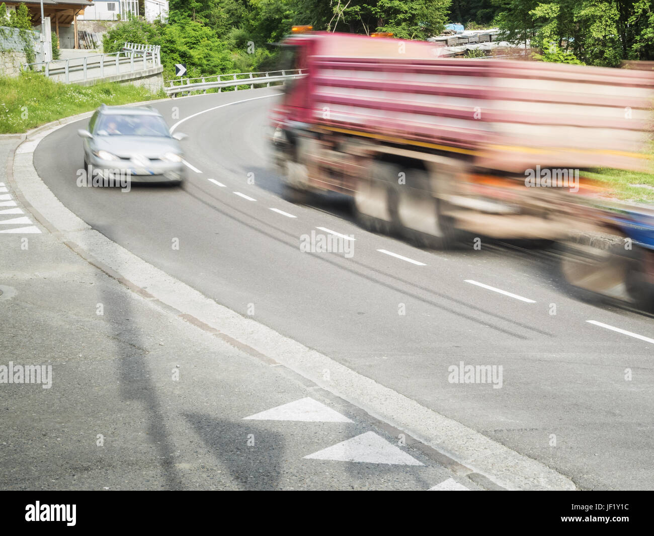 truck and car in the curve Stock Photo - Alamy