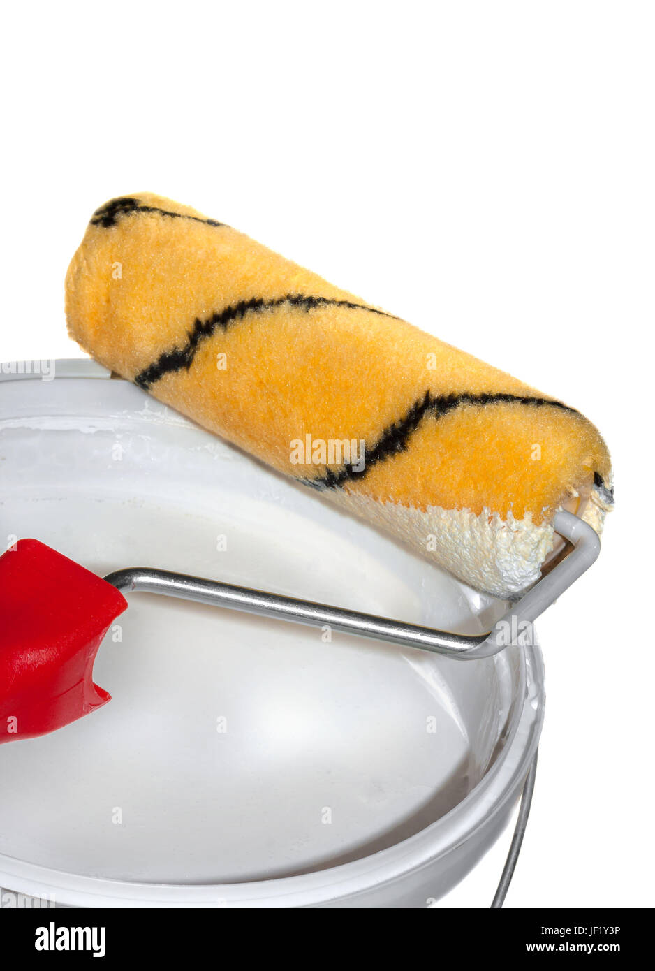 Paint roller on a bucket with paint Stock Photo - Alamy