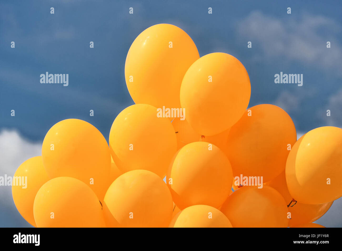 Yellow balloons hi-res stock photography and images - Alamy