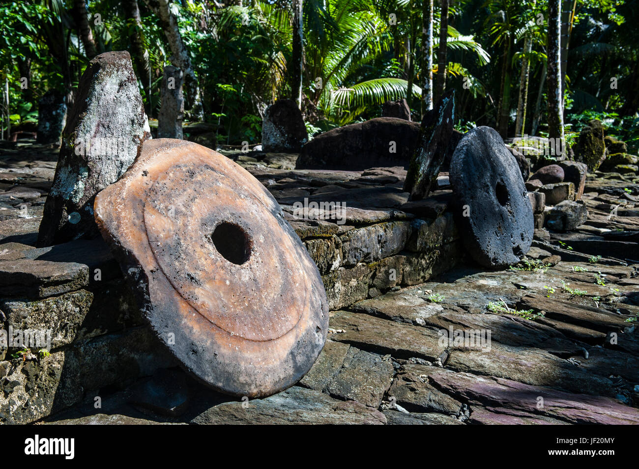Stone money on the island of Yap, Micronesia Stock Photo - Alamy