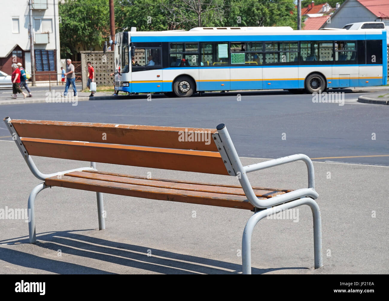 Bench at the bus terminal Stock Photo - Alamy