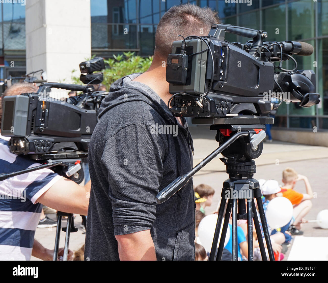 Cameramen at work Stock Photo - Alamy