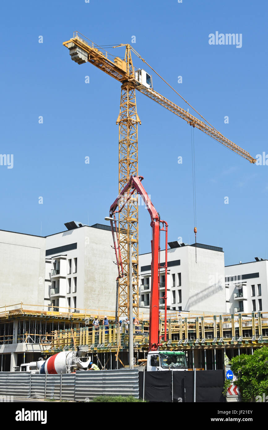Tower crane at the construction site Stock Photo - Alamy