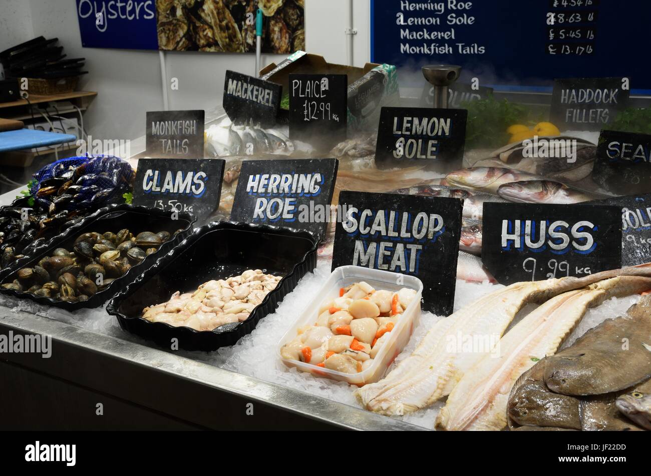 Fish items for sale at fish market Stock Photo - Alamy