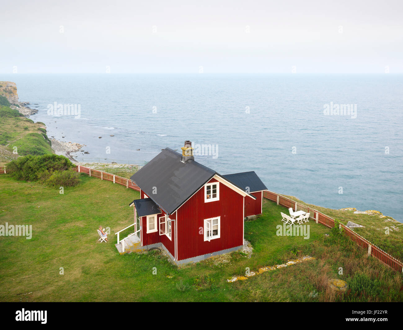 Wooden house at sea Stock Photo - Alamy
