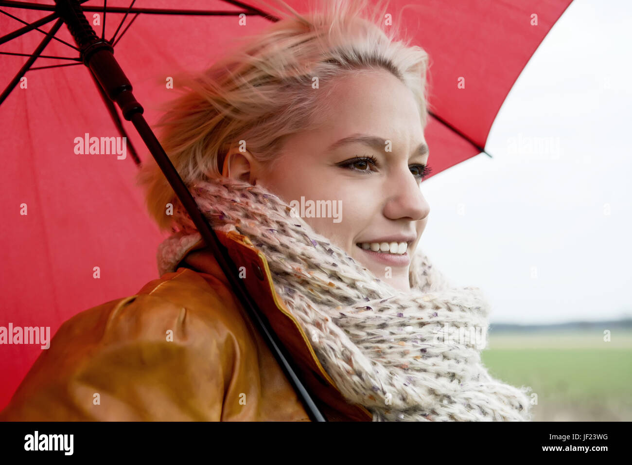 Wind umbrella hair woman hi-res stock photography and images - Alamy