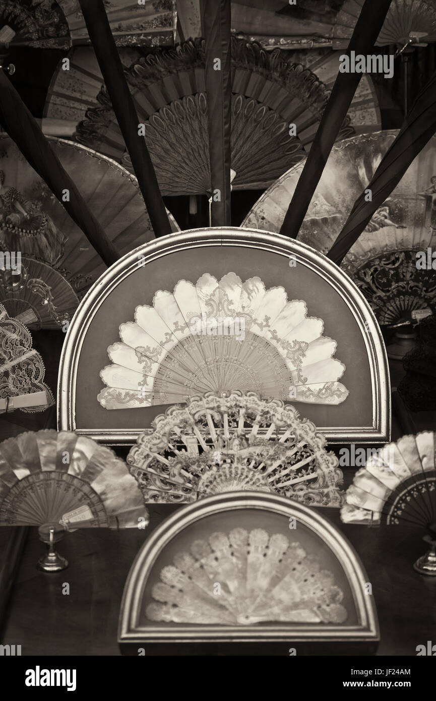 Decorative traditional Spanish fans displayed in a store window in ...