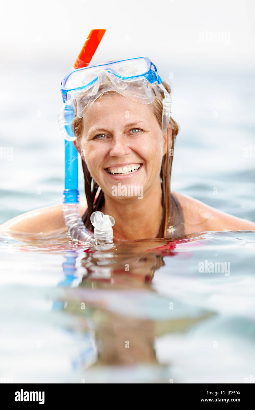 Portrait of woman wearing scuba mask Stock Photo - Alamy