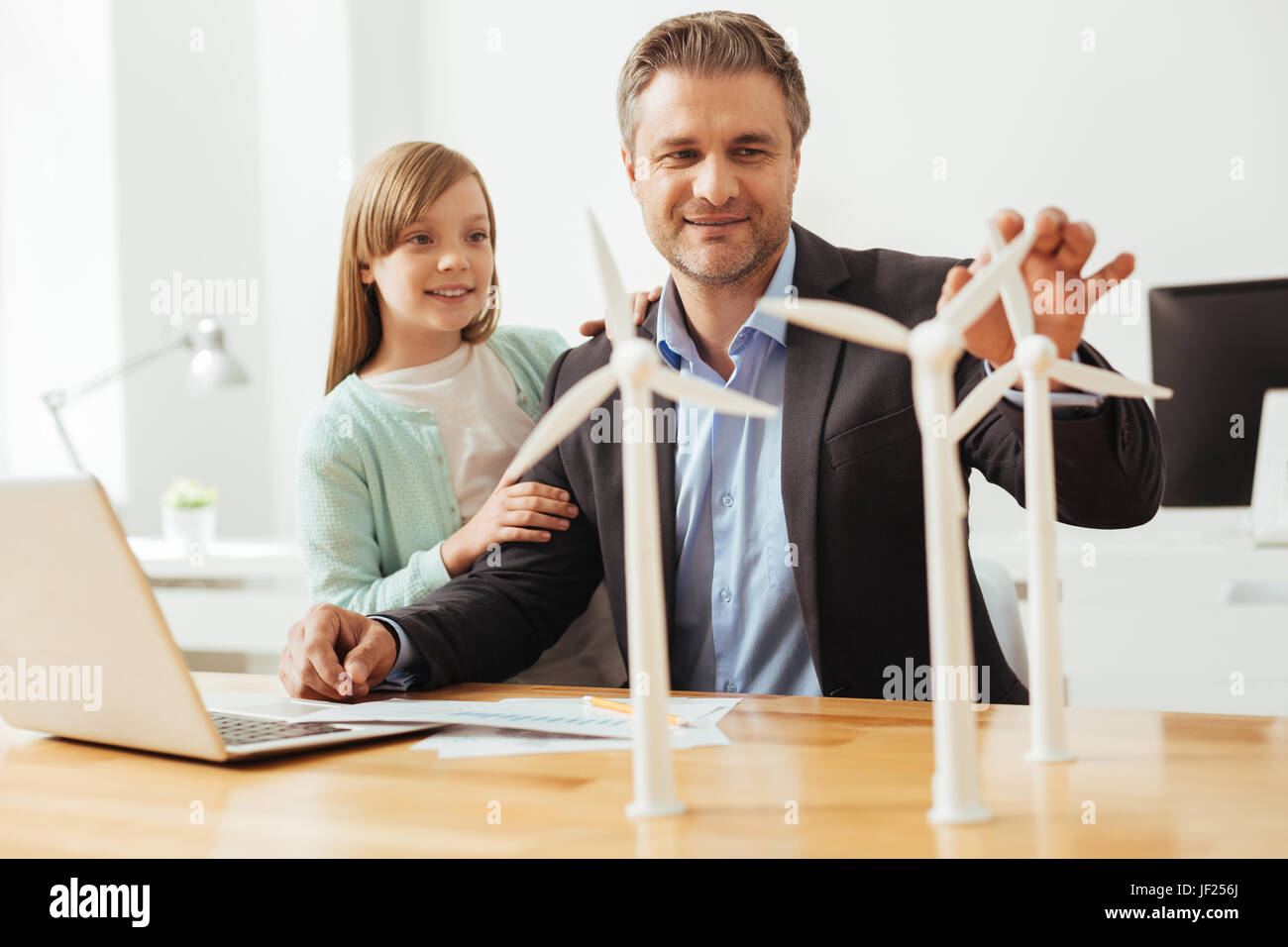 Proud dedicated man showing his project Stock Photo - Alamy