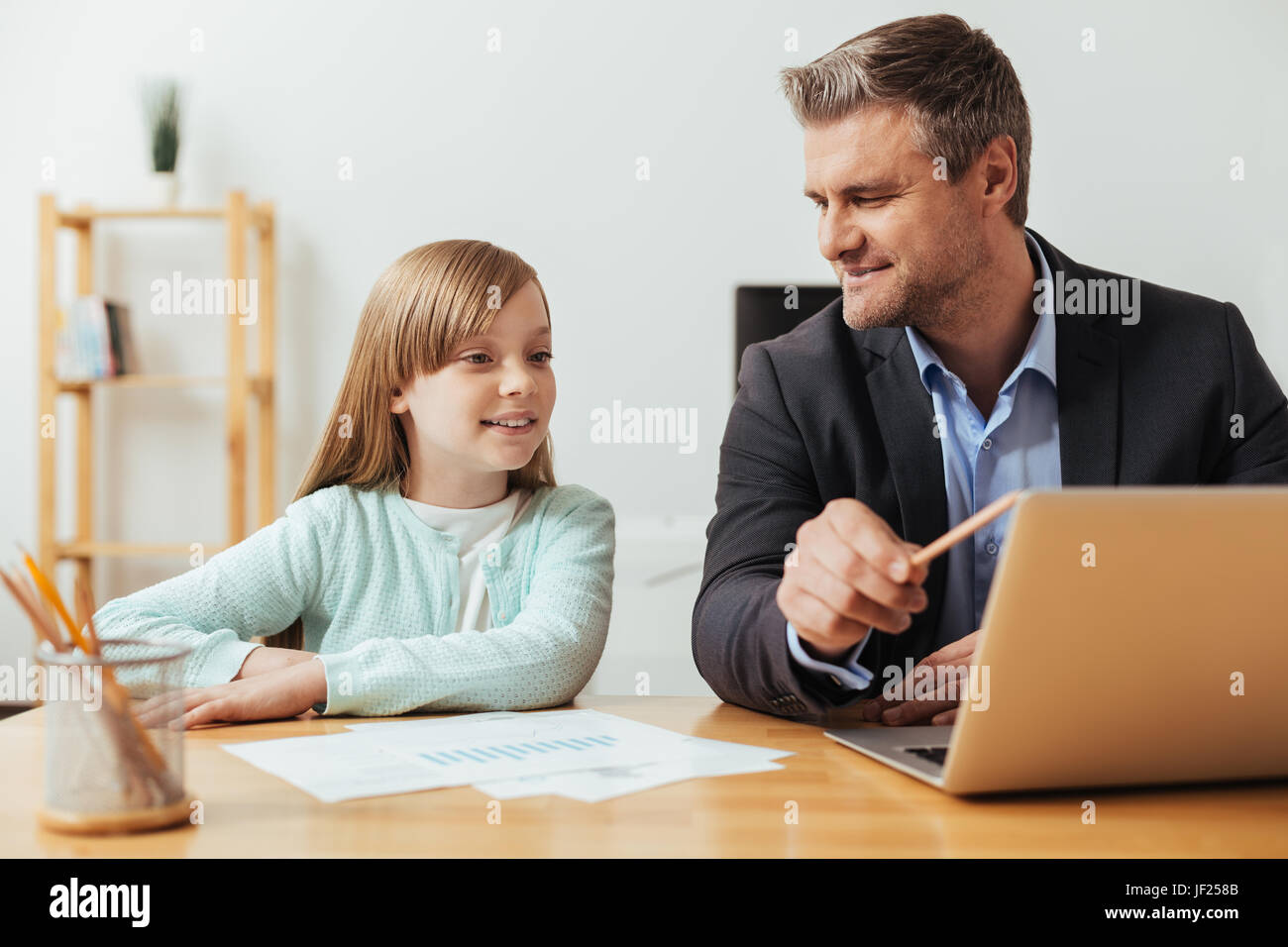 Talented inspired man giving a little lecture Stock Photo - Alamy