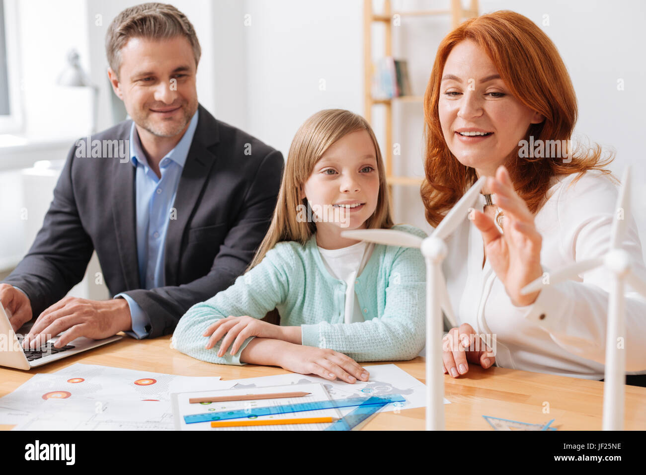 Stunning intelligent lady explaining things about renewable energy ...