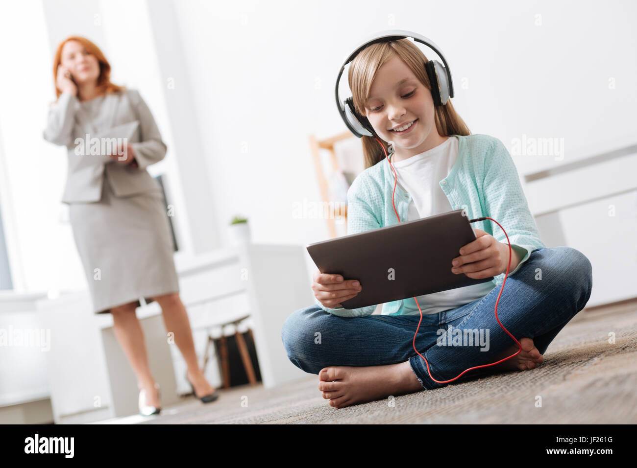 Imaginative active child enjoying a day in the office Stock Photo - Alamy