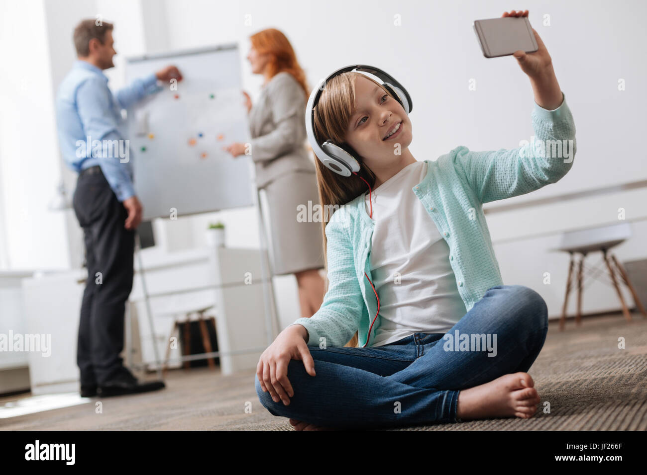 Passionate creative child having fun in the office Stock Photo - Alamy