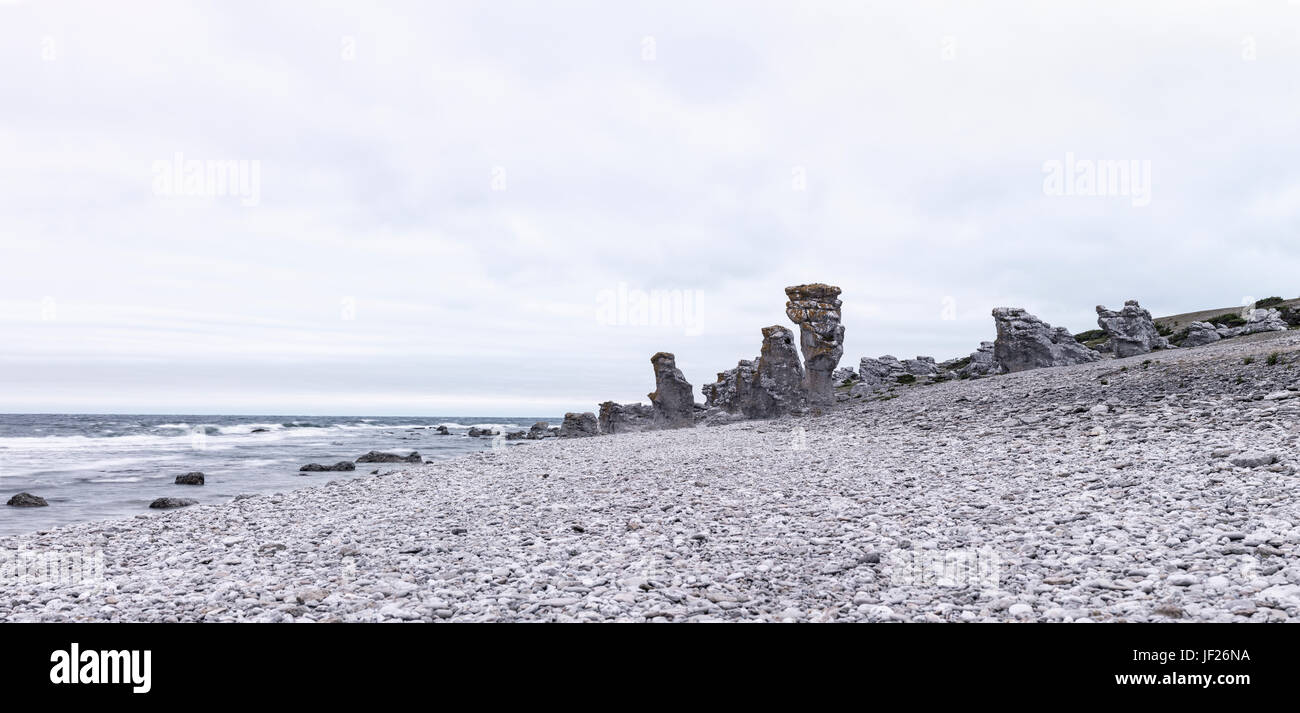 Rock formations on beach Stock Photo - Alamy