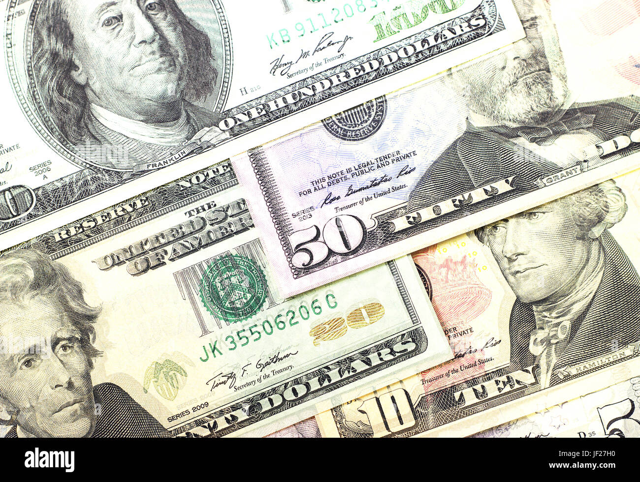 Abstract dollar bills of different denominations background Stock Photo ...