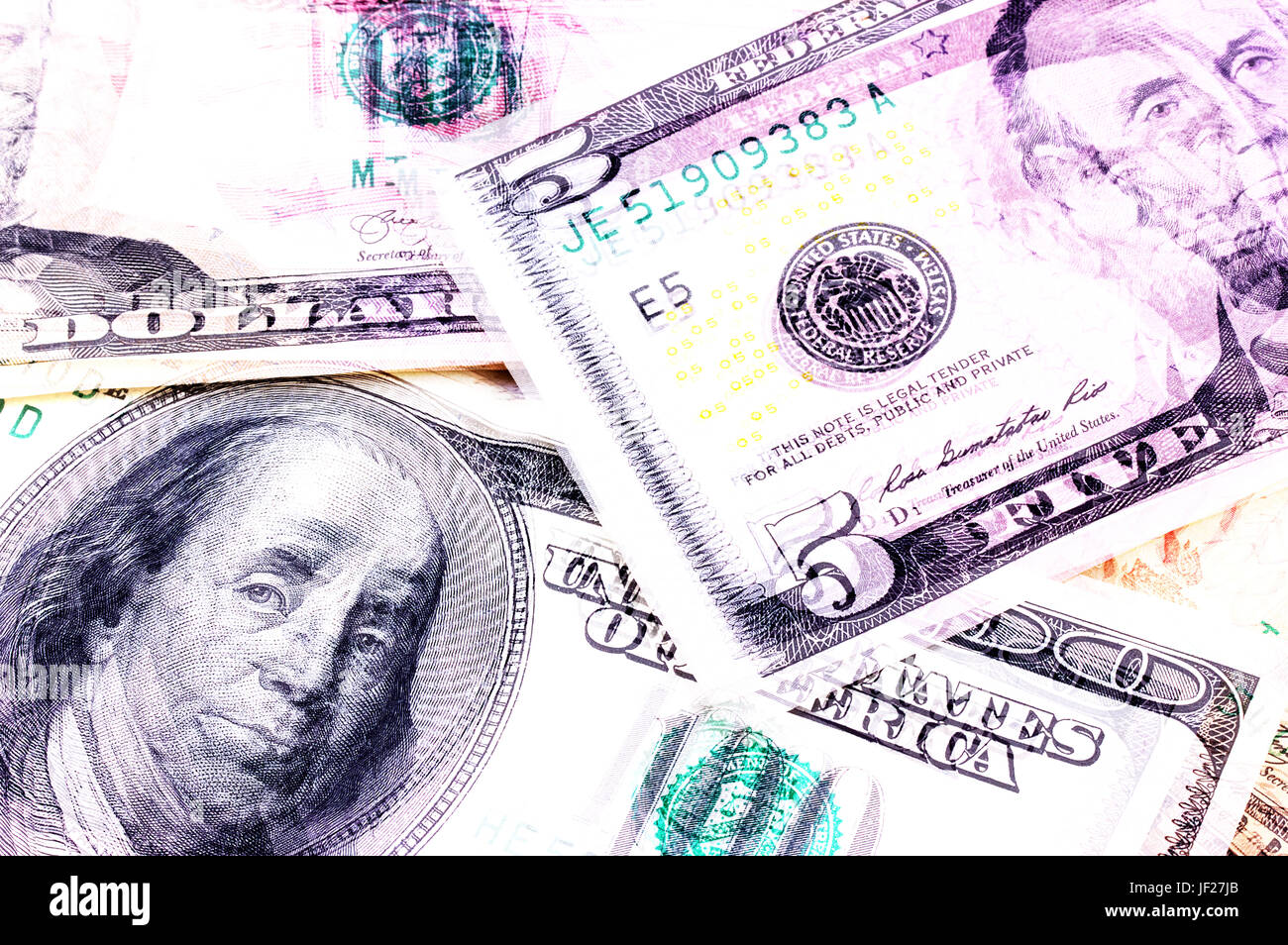 Abstract dollar bills of different denominations background Stock Photo ...