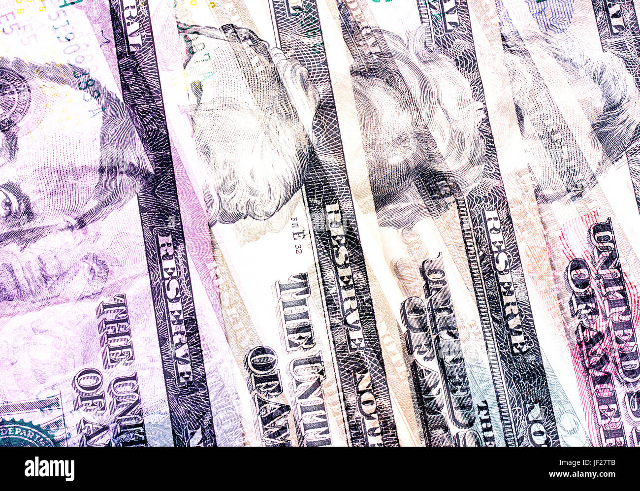 Abstract dollar bills of different denominations background Stock Photo ...