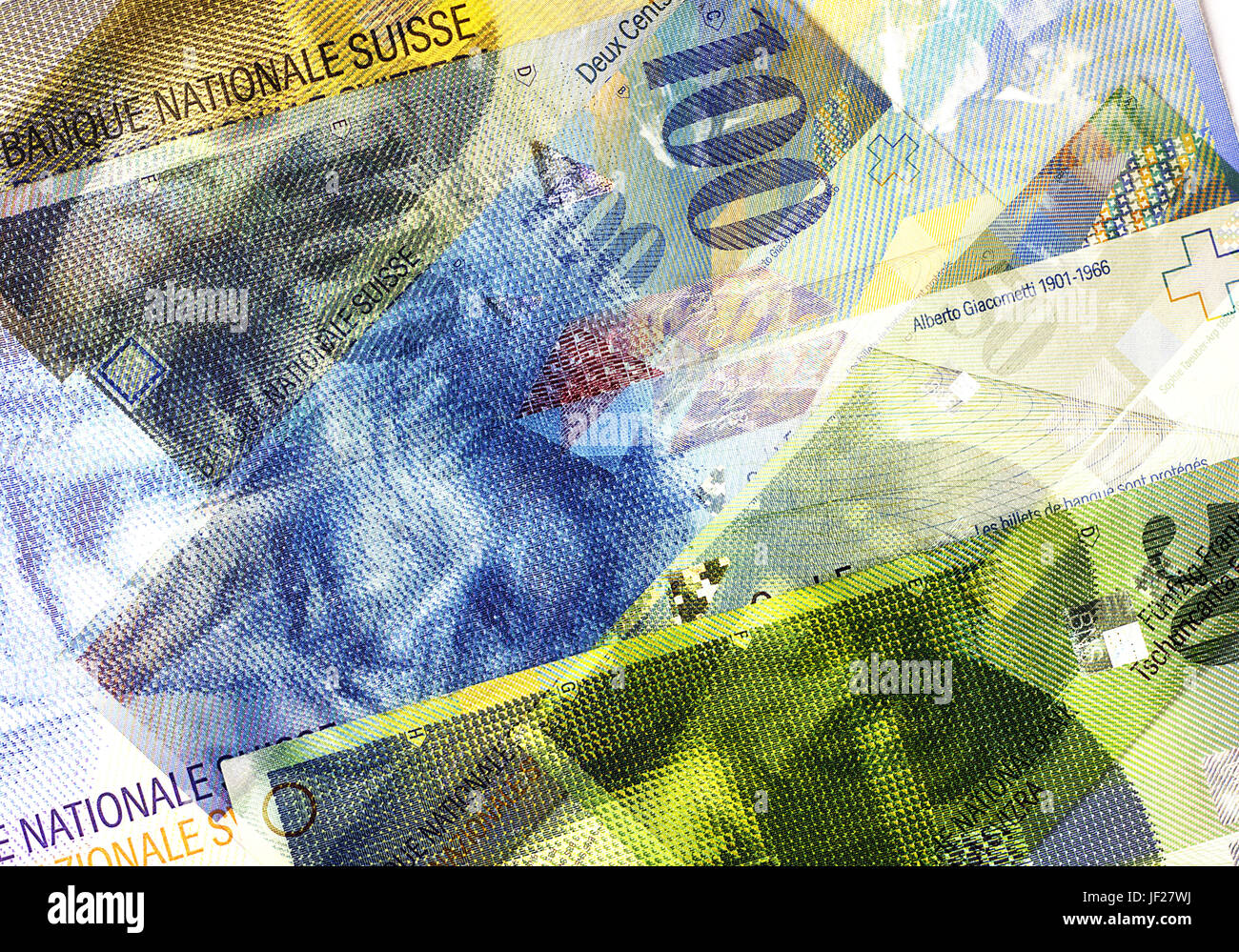Swiss franc banknotes of different denominations. Abstract Money ...