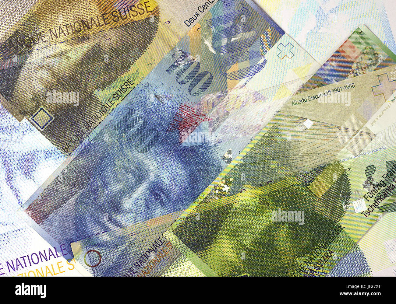 Swiss franc banknotes of different denominations. Abstract Money ...
