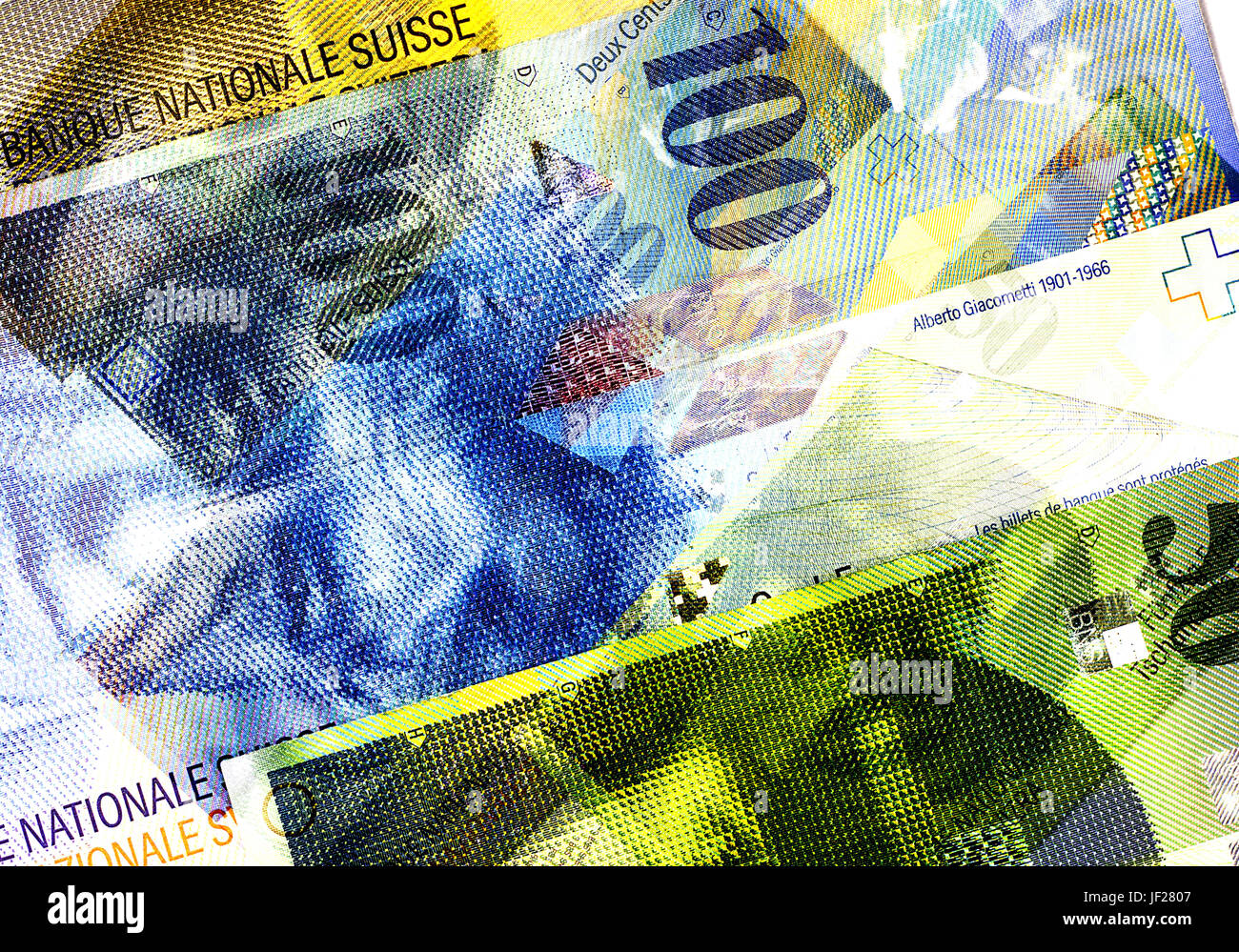 Swiss franc banknotes of different denominations. Abstract Money ...