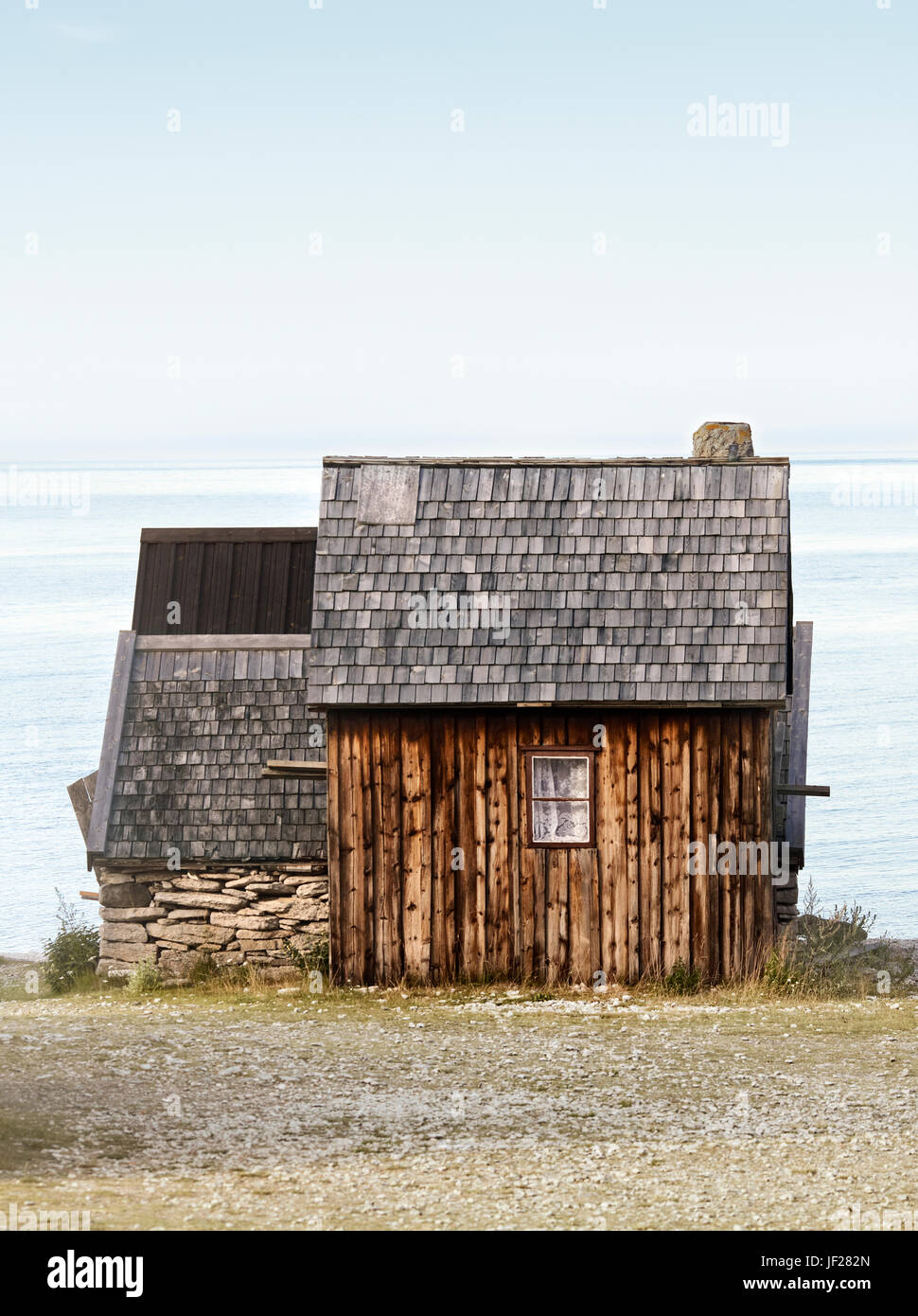 Wooden house at sea Stock Photo - Alamy