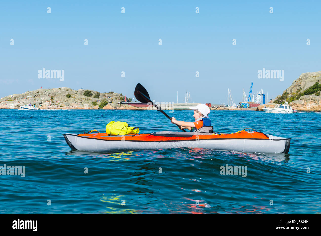 Boys kayak sea hi-res stock photography and images - Alamy