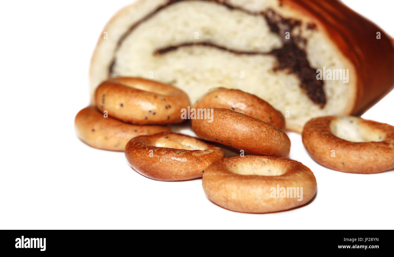 Broken roll with poppy seeds and bagels Stock Photo - Alamy