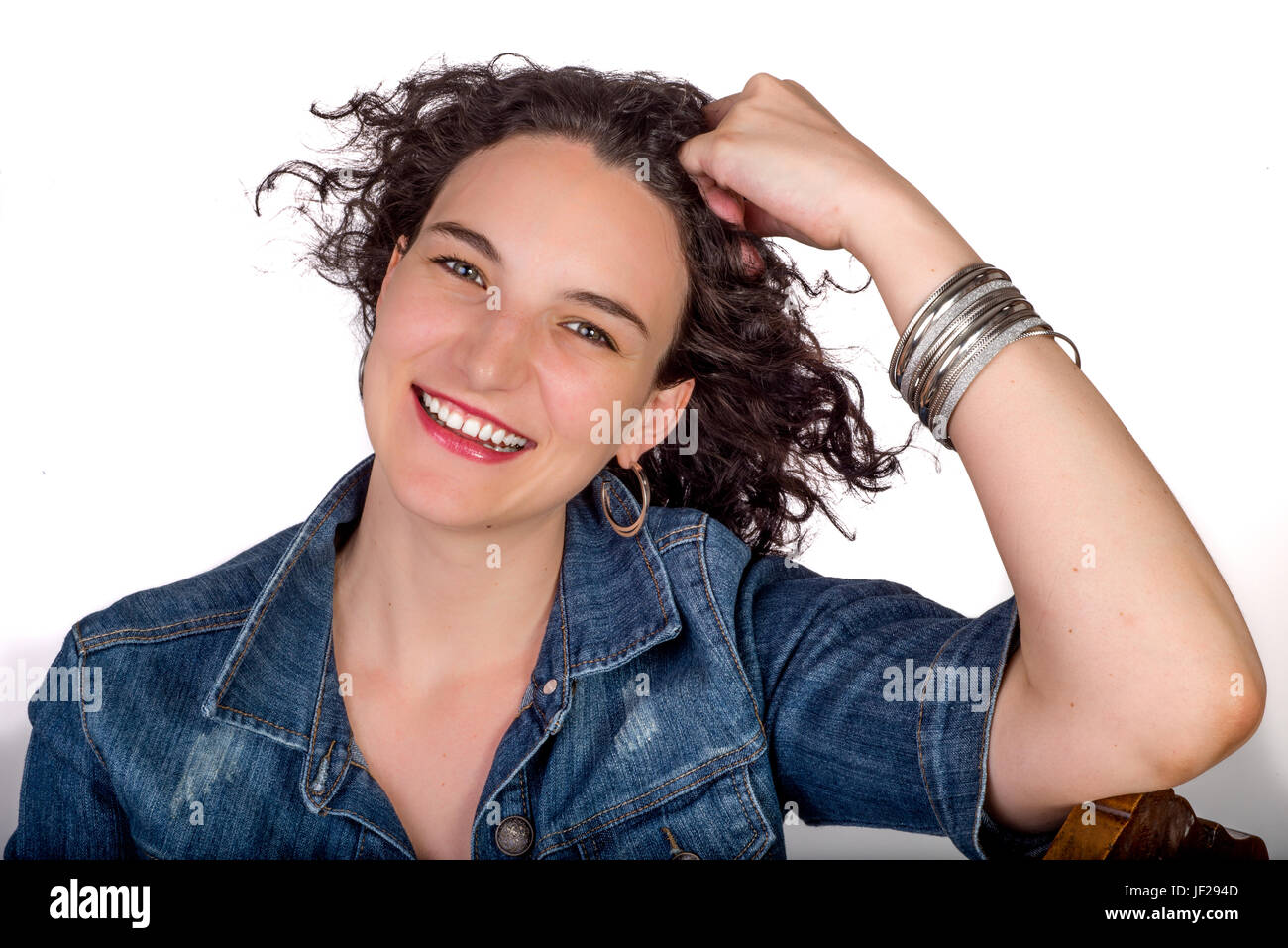 Young Woman with hand on head Stock Photo - Alamy