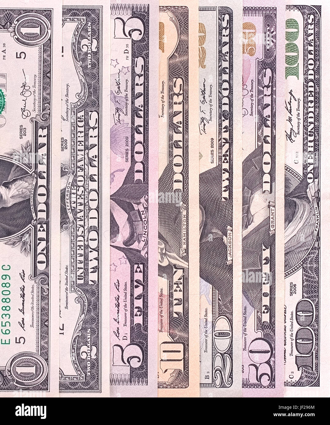 Abstract dollar bills of different denominations background Stock Photo ...