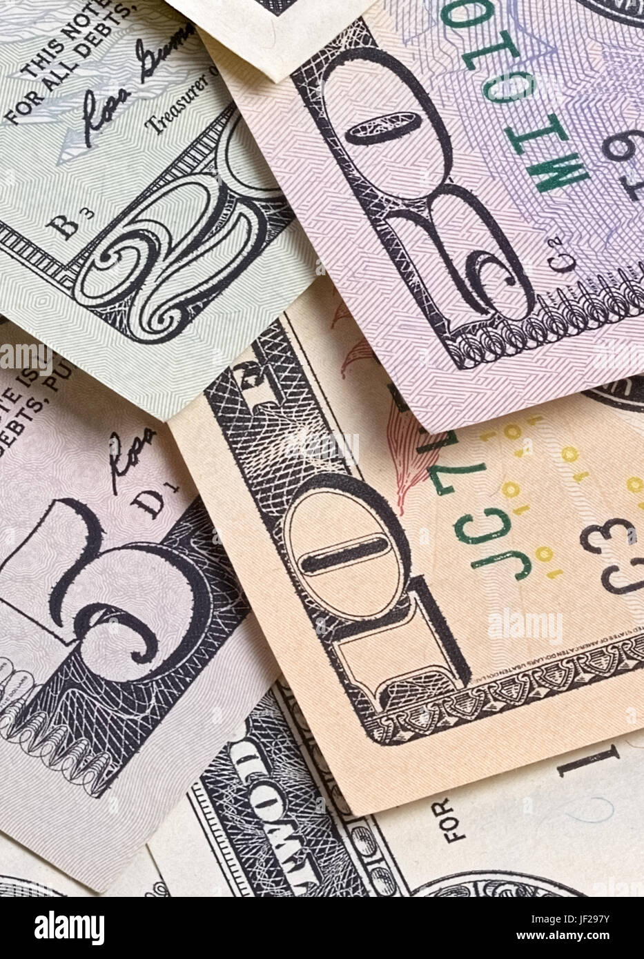 Abstract dollar bills of different denominations background Stock Photo ...