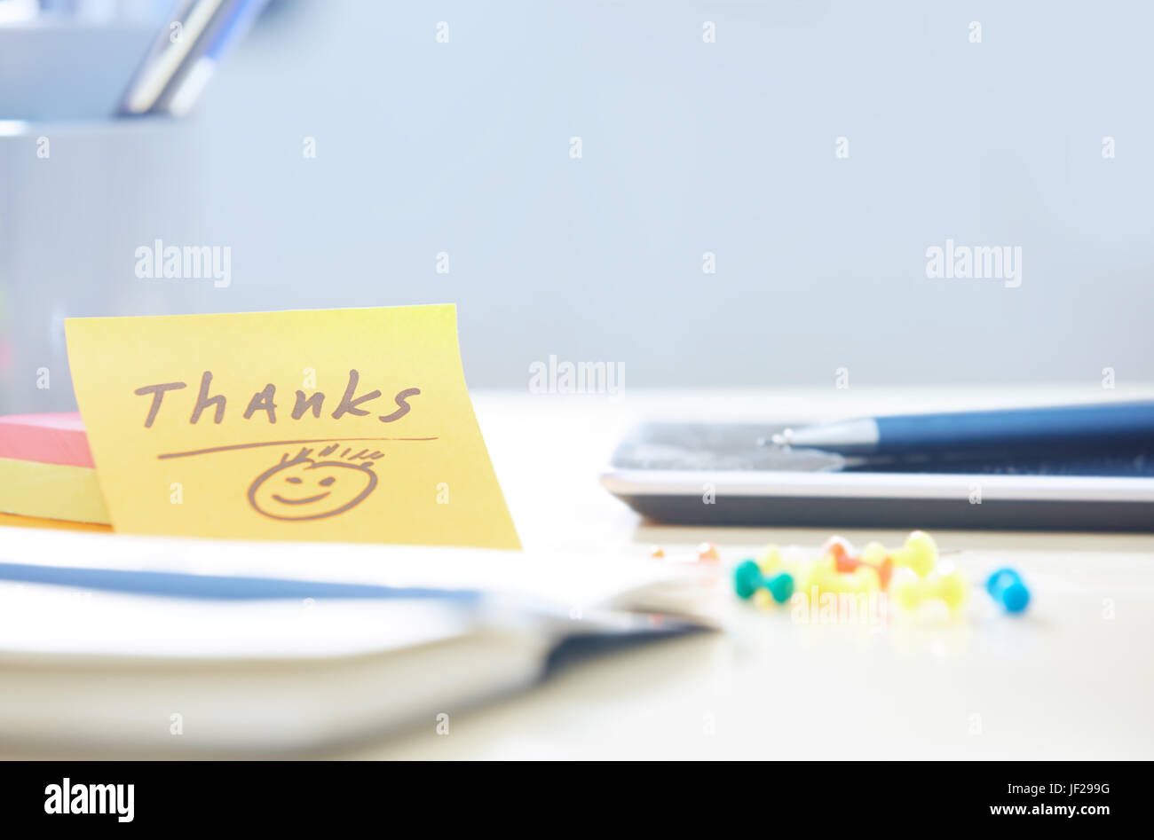 Thanks text on adhesive note Stock Photo - Alamy