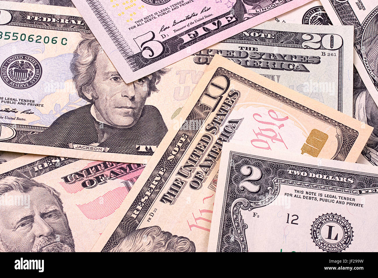 Abstract dollar bills of different denominations background Stock Photo ...