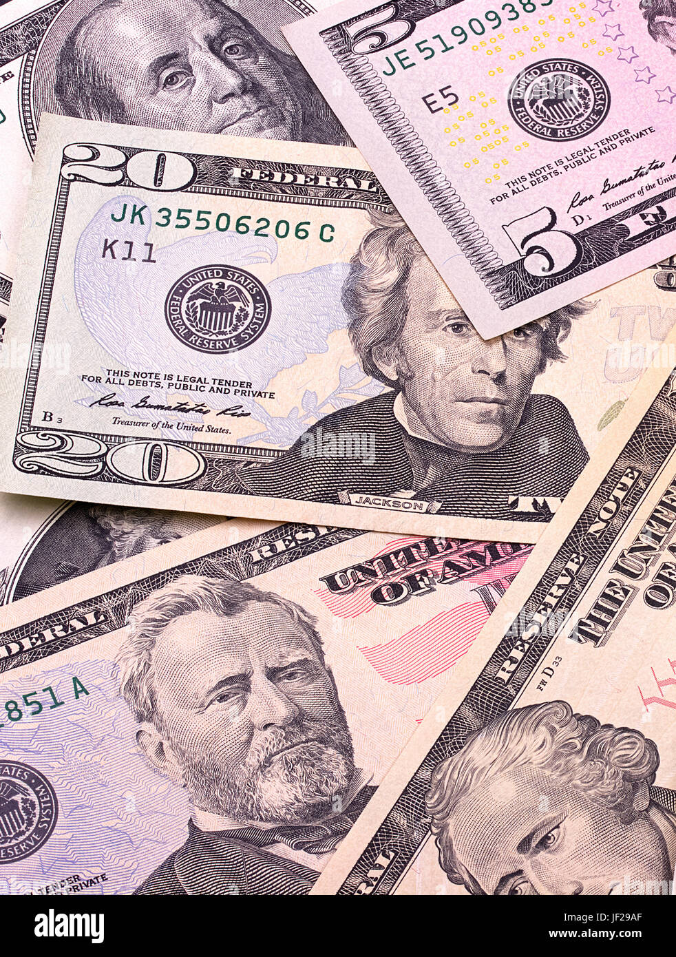 Abstract dollar bills of different denominations background Stock Photo ...